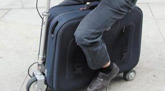 Hunan Man Spends 10 Years Inventing Drivable Suitcase